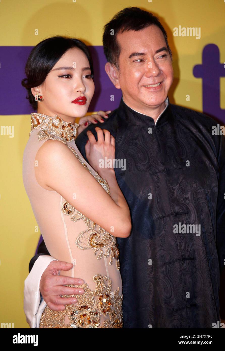 Chinese actress Zhou Chu Chu, left, and Hong Kong actor Anthony Wong pose for the photographers ...