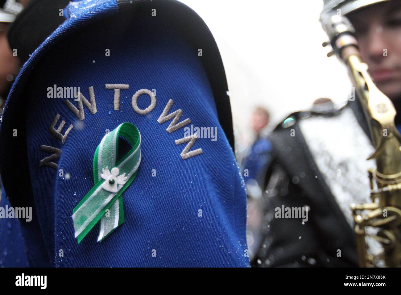 A green and white ribbon, the colors of Sandy Hook Elememtary School in ...