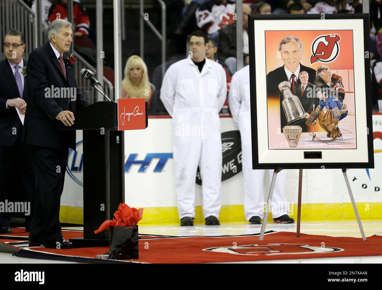 Former New Jersey Devils goalkeeper coach Jacques Caron, left, talks ...