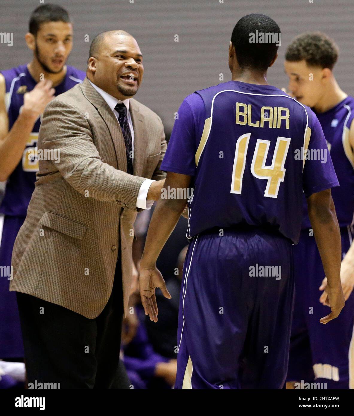 Prairie View A&M coach Byron Rimm II talks to Carl Blair (14) as he ...