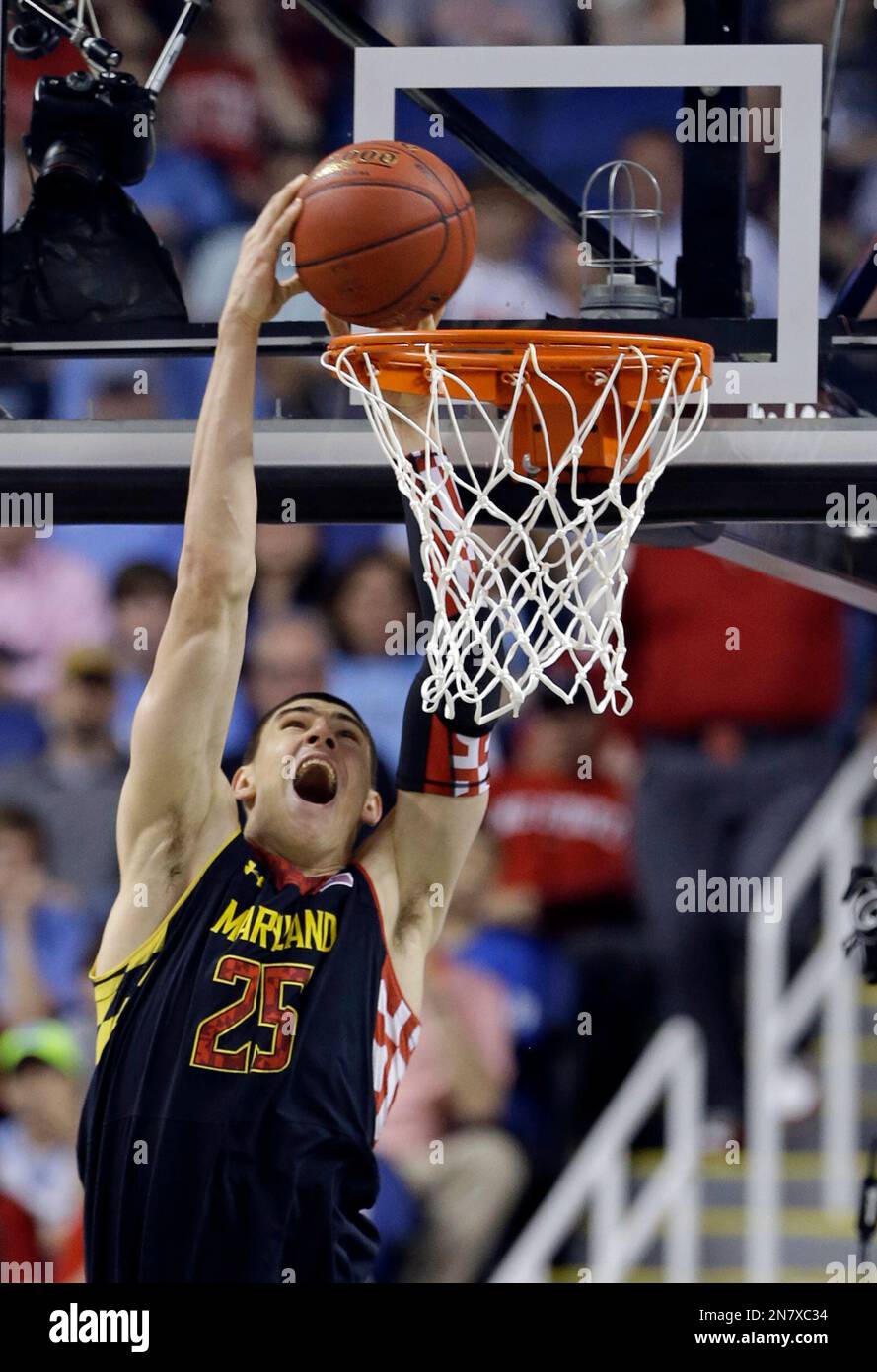 Maryland's Alex Len (25) dunks against North Carolina during the first ...