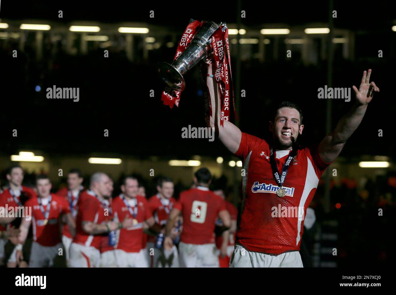 Wales' Alex Cuthbert celebrates with the trophy after they defeated ...