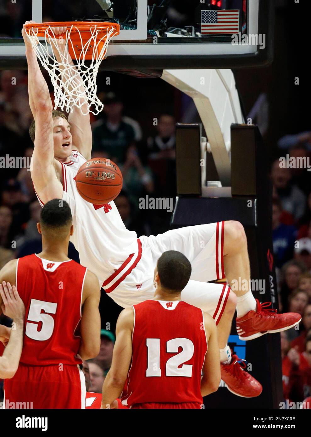 Wisconsin's Ryan Evans (5) and Traevon Jackson (12) watch as Indiana's ...