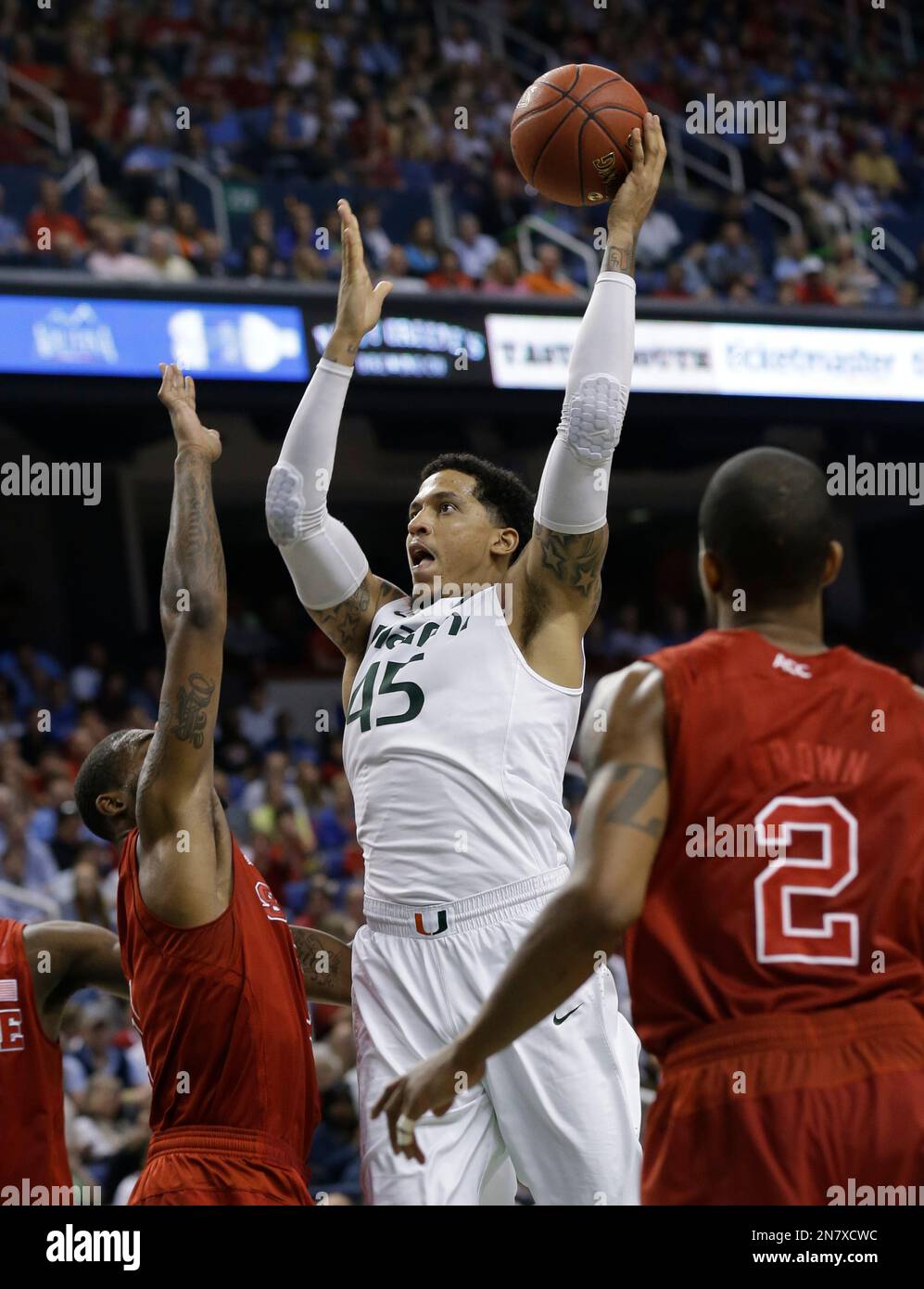 Miami's Julian Gamble (45) shoots over North Carolina State's Lorenzo ...