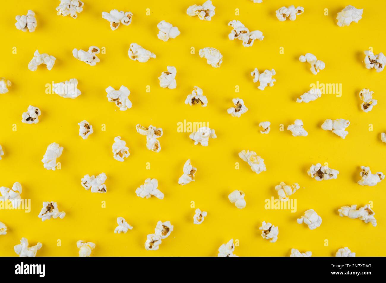 elevated view popcorn yellow surface Stock Photo - Alamy