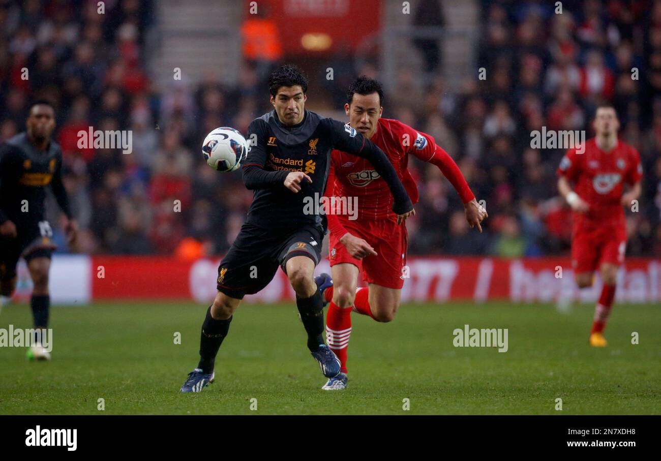 Southampton's Maya Yoshida, right, competes for the ball with Liverpool ...
