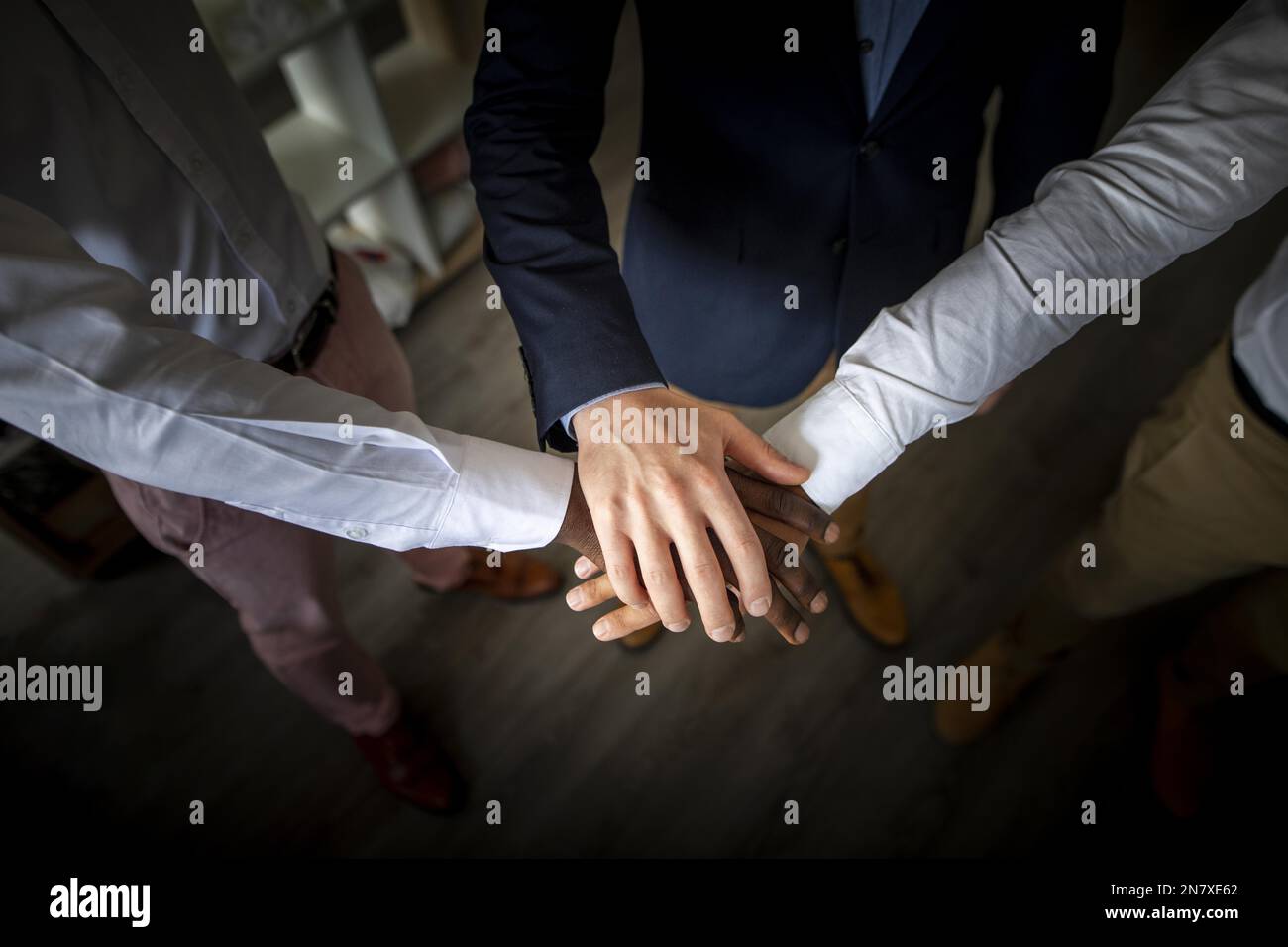 Office joining hand together hi-res stock photography and images - Alamy