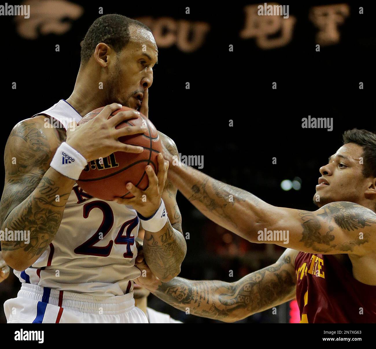 Iowa State guard Chris Babb, right, tries to steal the ball from Kansas ...