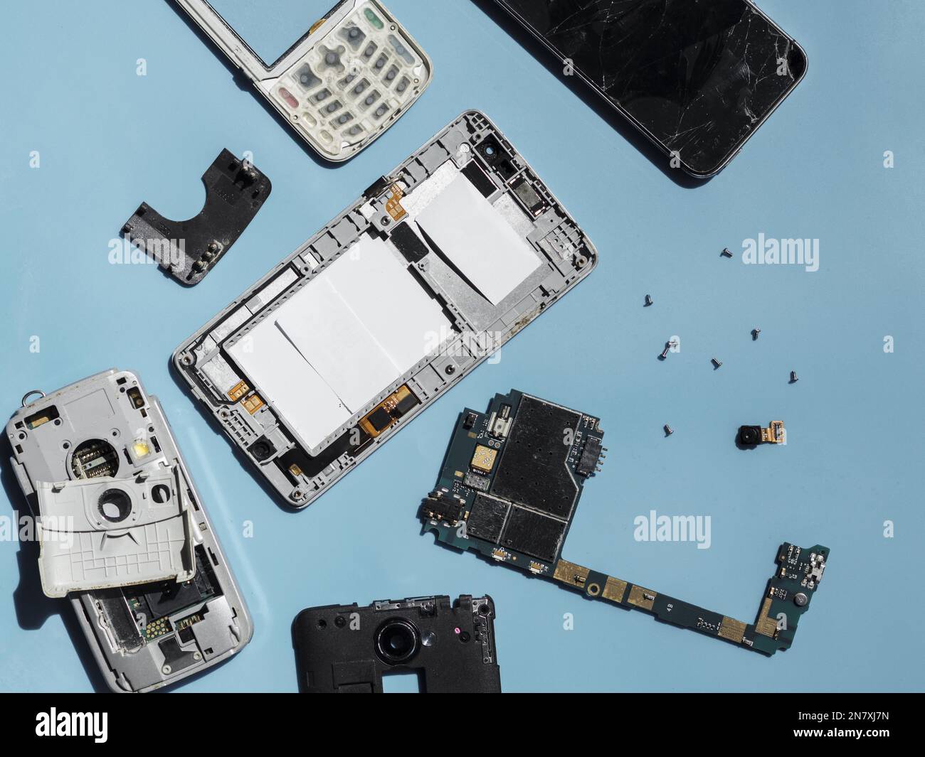 flat lay disassembled phone parts Stock Photo - Alamy