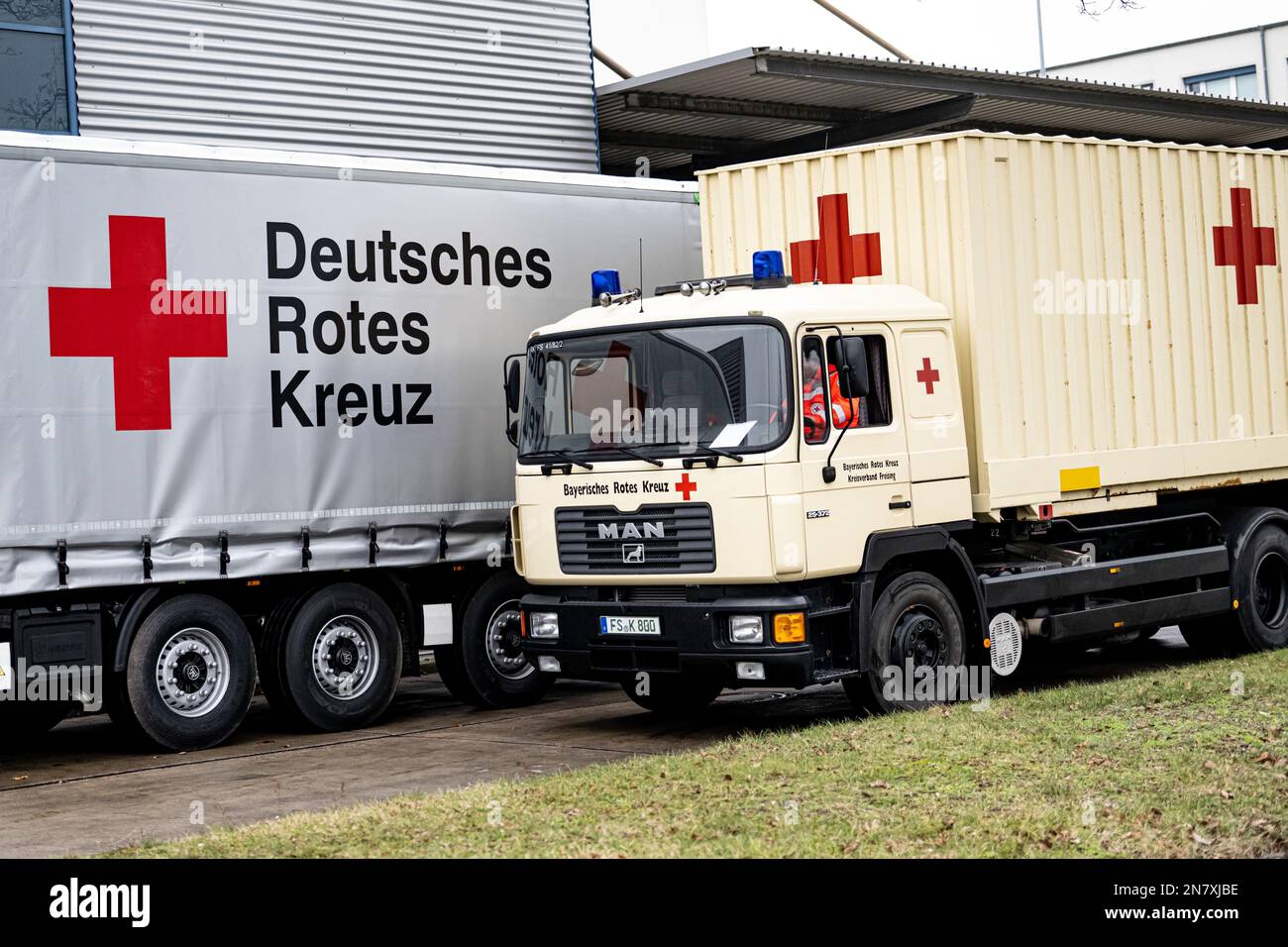 11 February 2023, Brandenburg, Schönefeld: A truck of the German Red ...