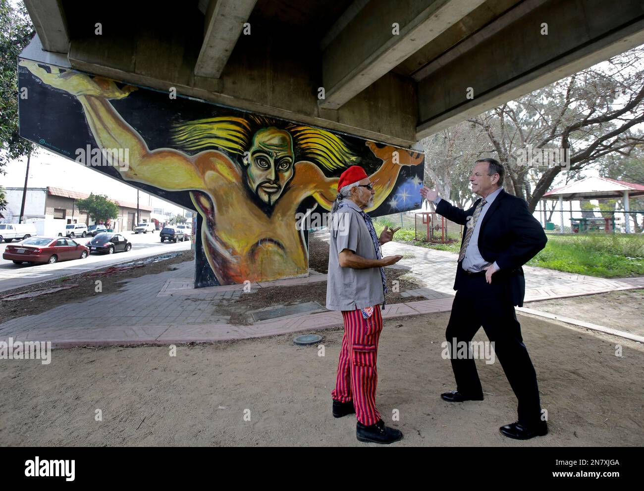 San Diego Mayor Bob Filner, right, talks with artist Mario Terero about ...