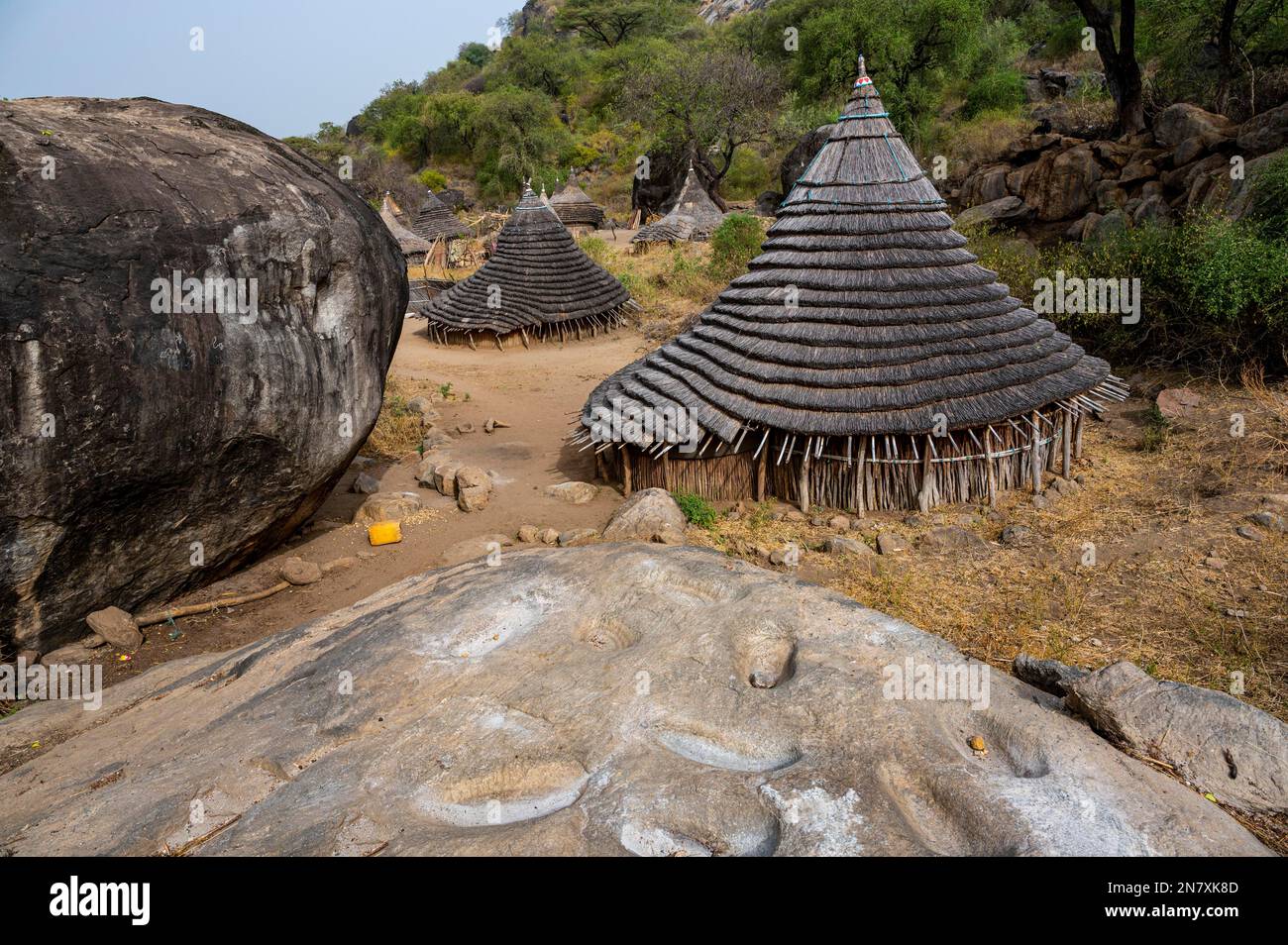 Traditionally built huts of the Laarim tribe, Boya hills, Eastern ...