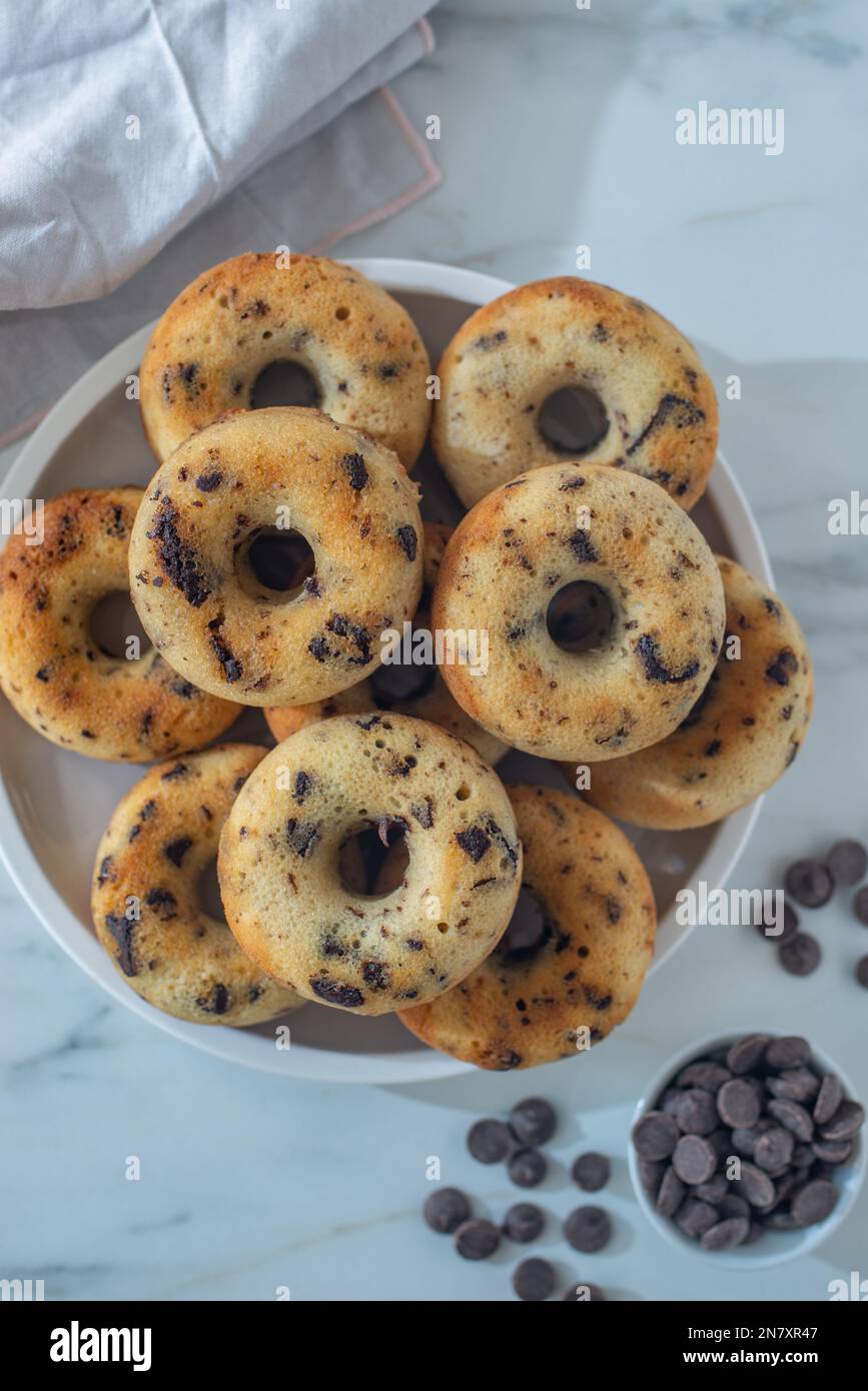 sweet home made chocolate chip donuts Stock Photo - Alamy