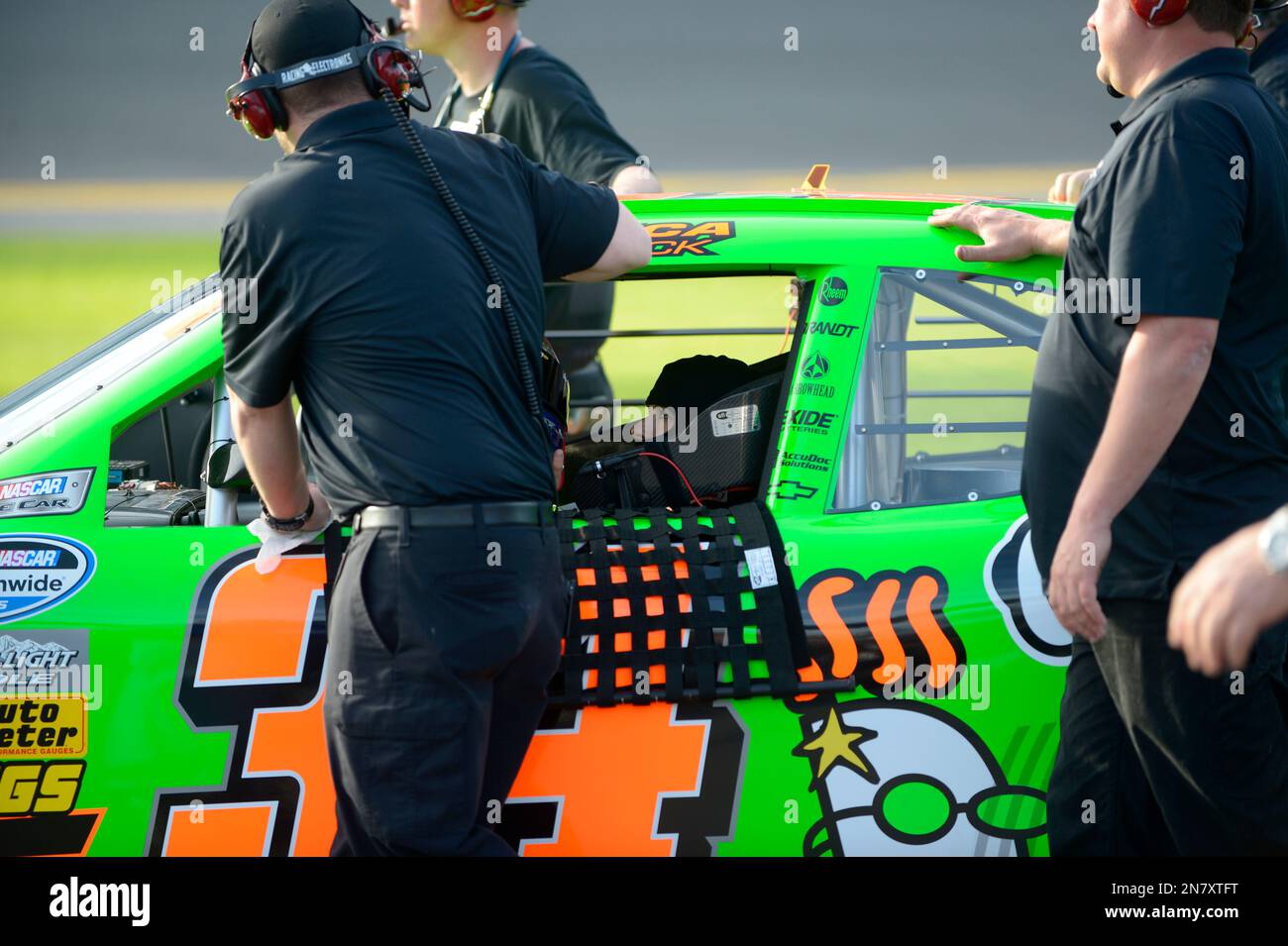 Danica Patrick is pushed to the front of the line on pit row during ...