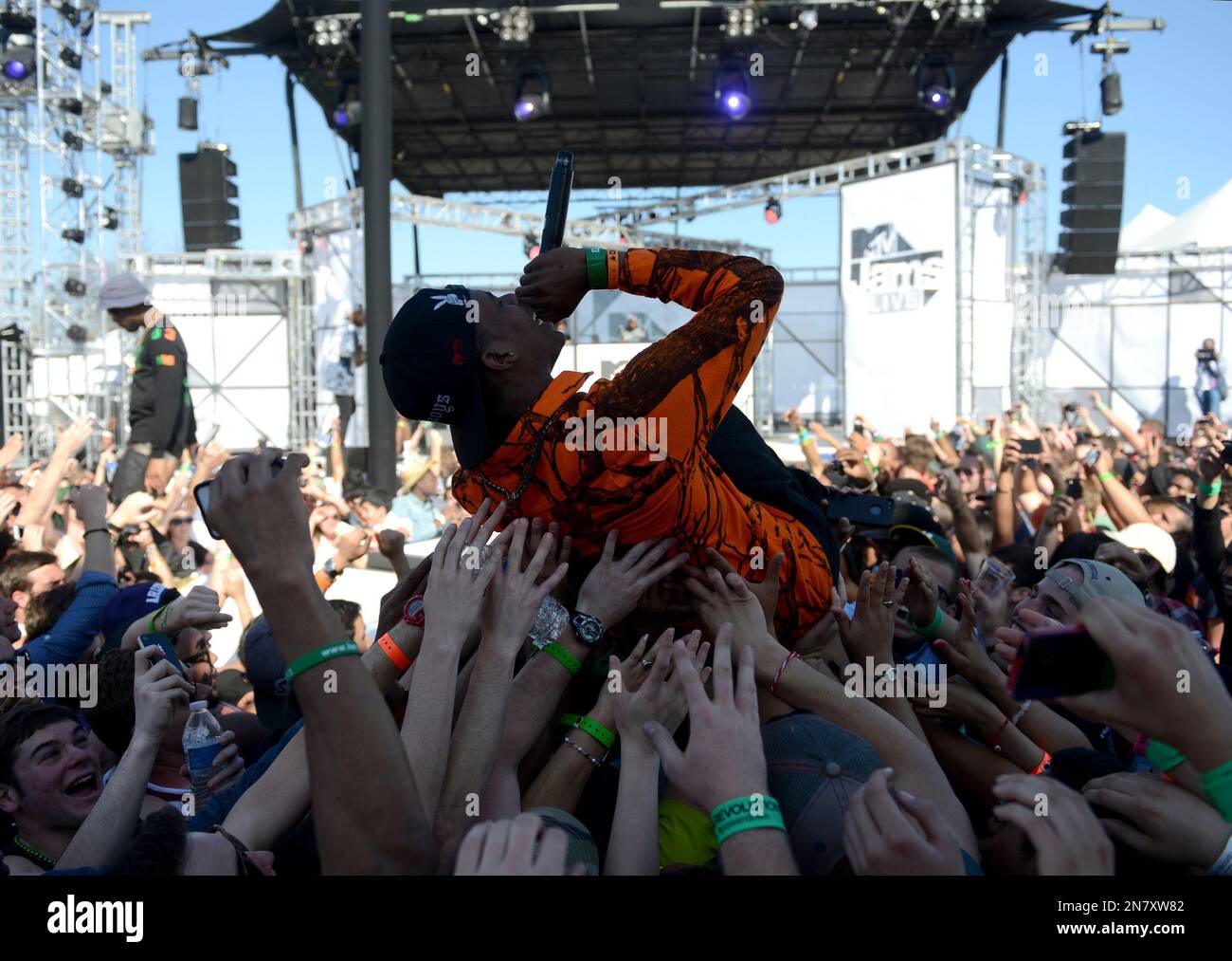 Rapper Travi$ Scott floats on the audience as he performs at the mtvU ...