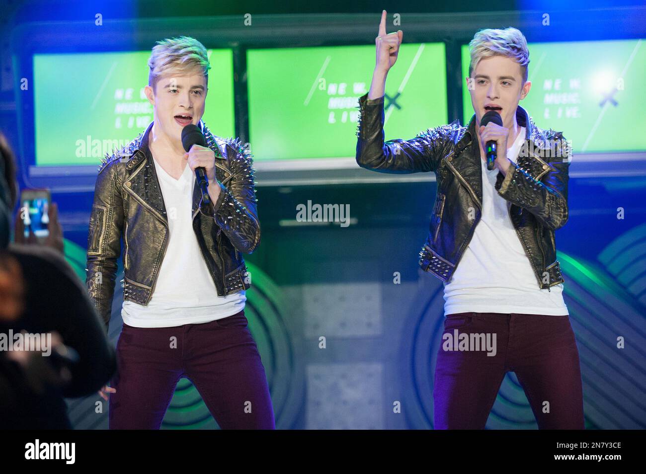 Singers John Grimes and Edward Grimes (aka Jedward) perform on-stage ...