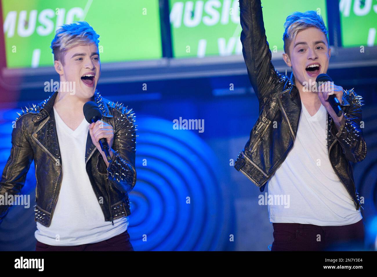 Singers John Grimes and Edward Grimes (aka Jedward) perform on-stage ...