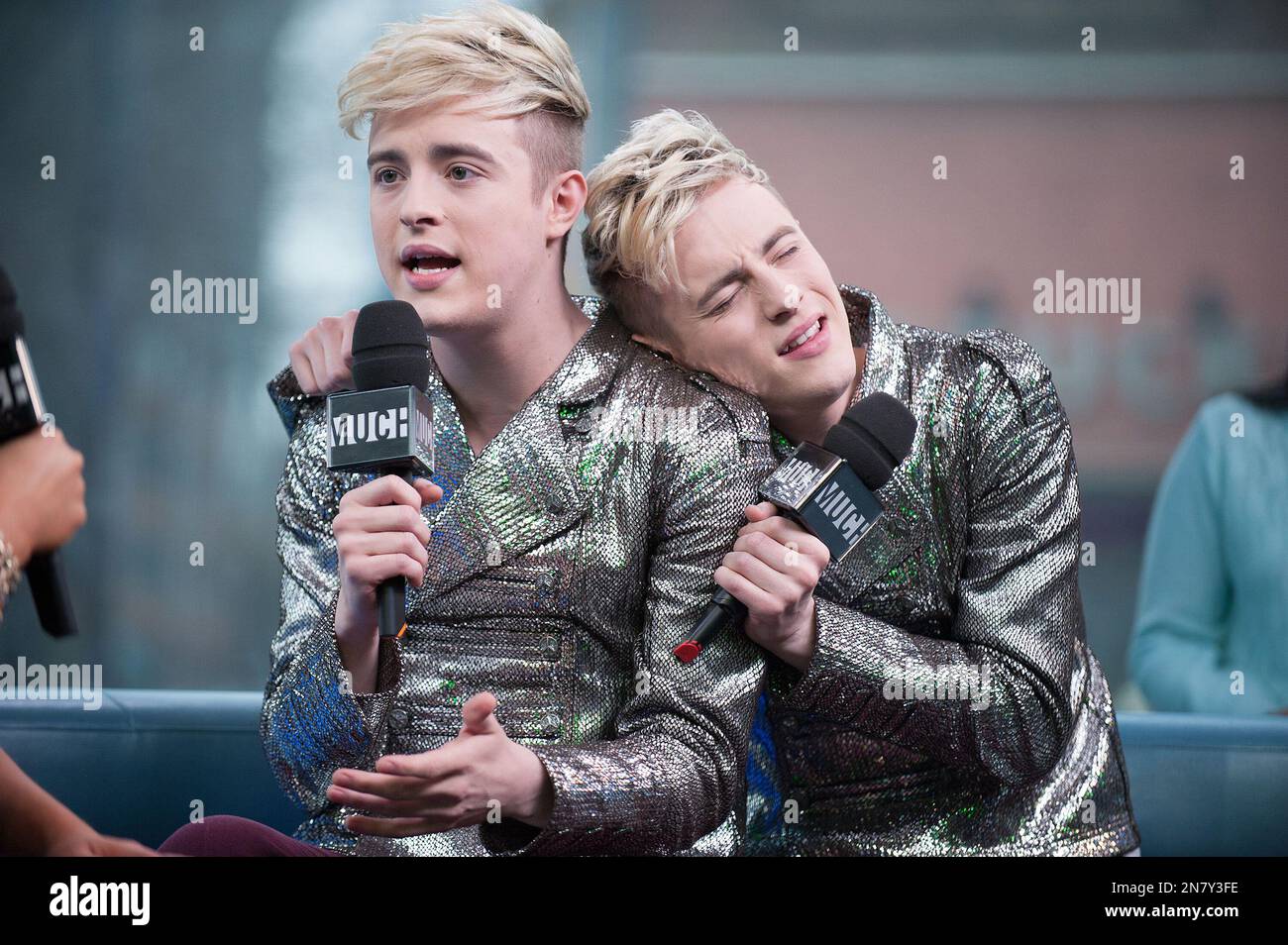 Singers John Grimes and Edward Grimes (aka Jedward) speak during their ...