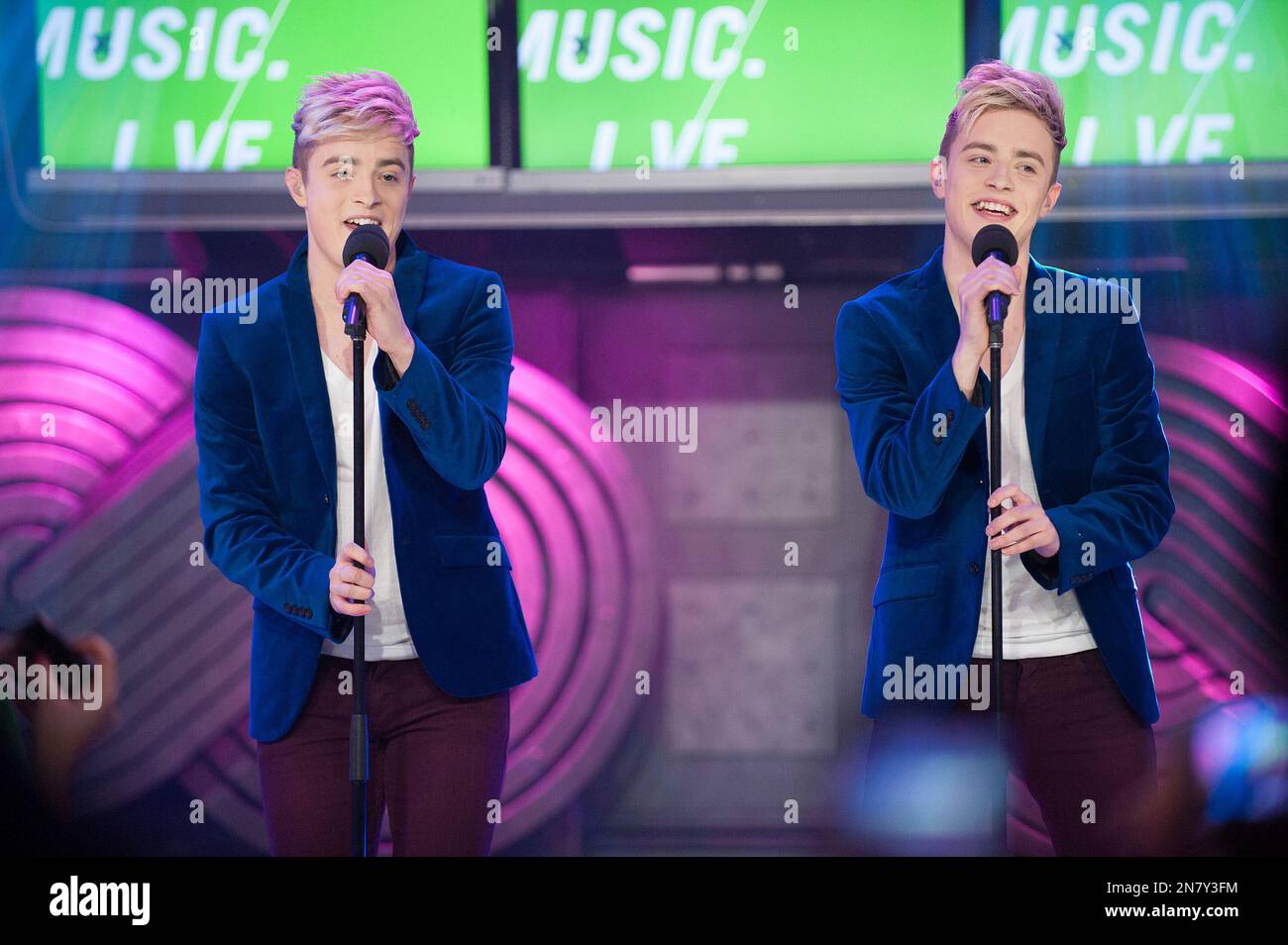 Singers John Grimes and Edward Grimes (aka Jedward) perform on-stage ...