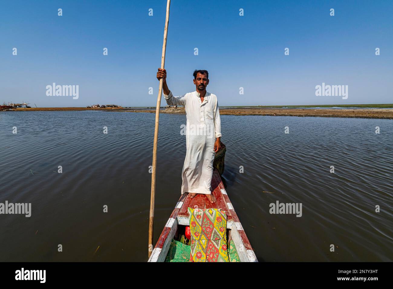 Marsh arab on his boat, Mesopotamian Marshes, Ahwar of southern Iraq ...