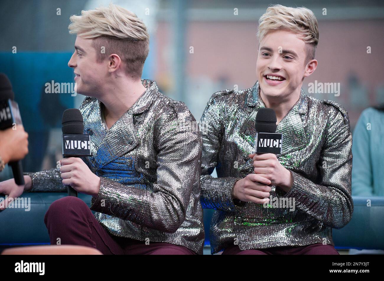 Singers John Grimes and Edward Grimes (aka Jedward) speak during their ...