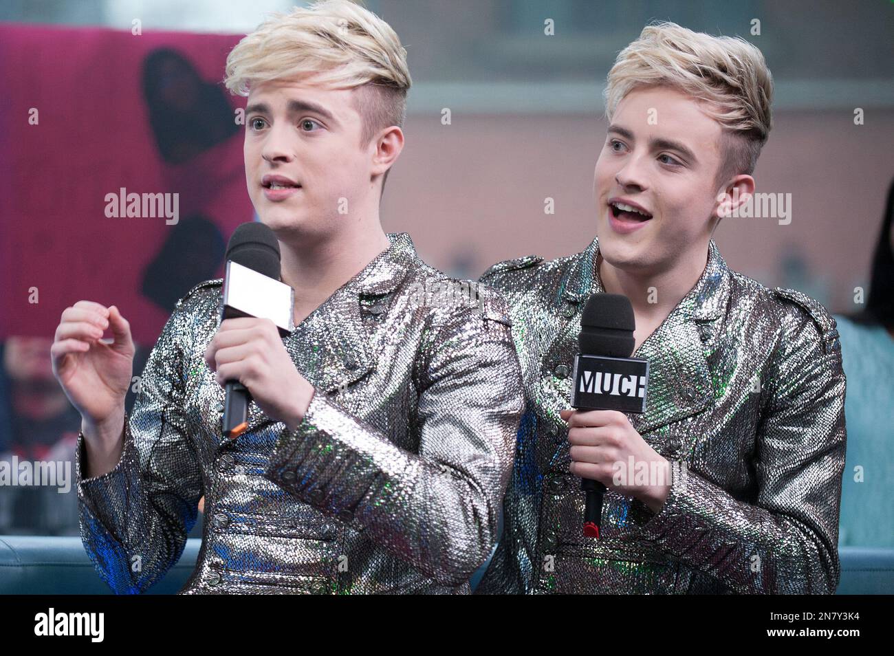 Singers John Grimes and Edward Grimes (aka Jedward) speak during their ...