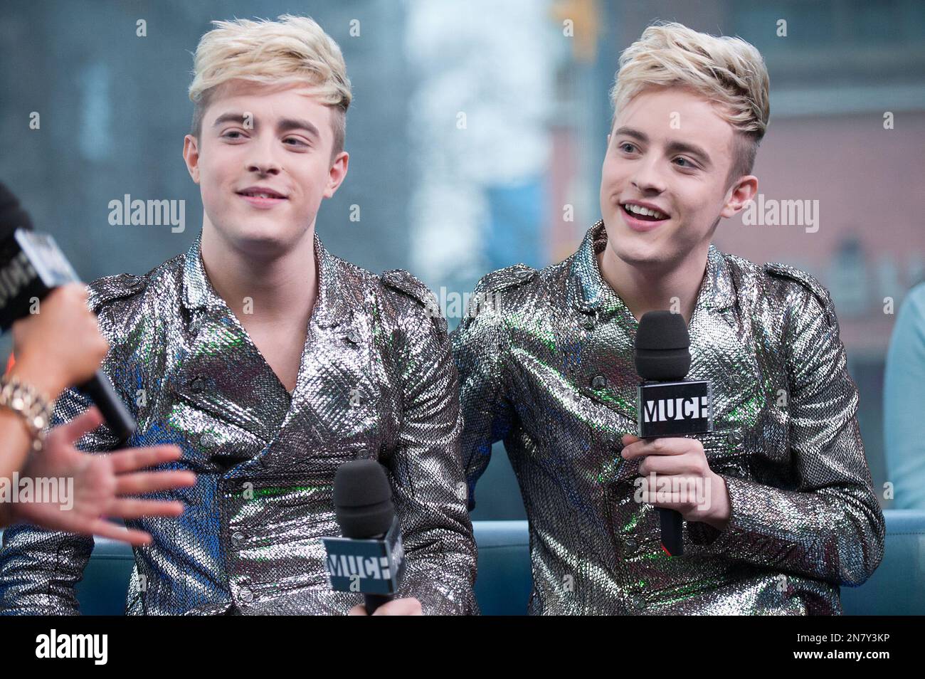 Singers John Grimes and Edward Grimes (aka Jedward) speak during their ...