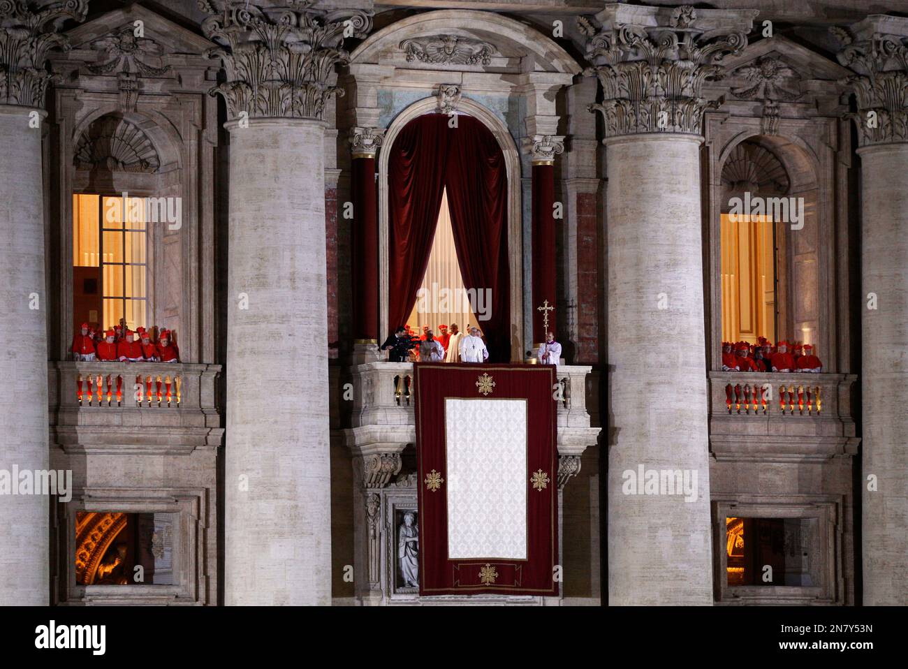 Pope Francis stands at the central balcony of St. Peter's Basilica at ...