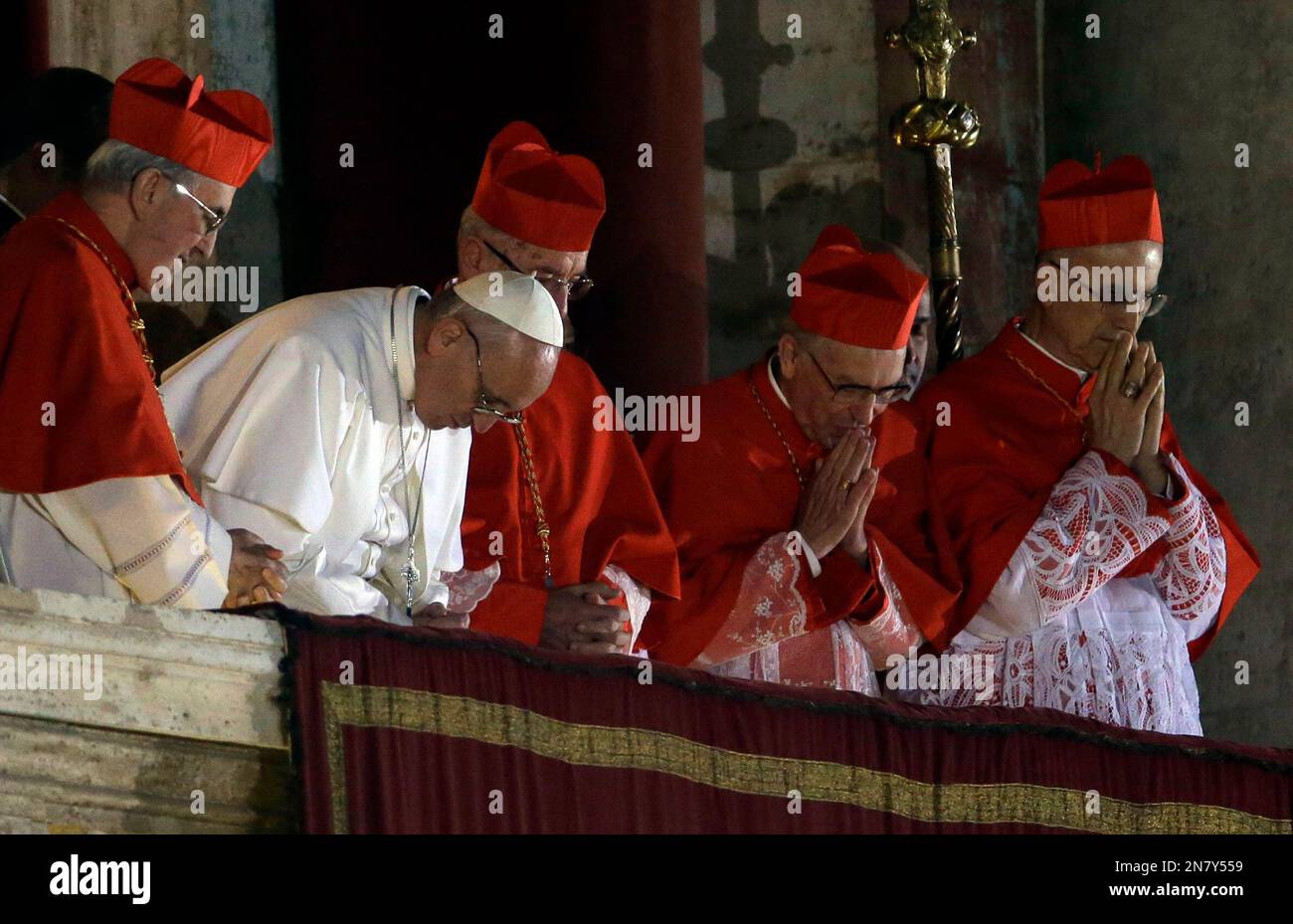 Pope Francis speaks from the central balcony of St. Peter's Basilica at ...