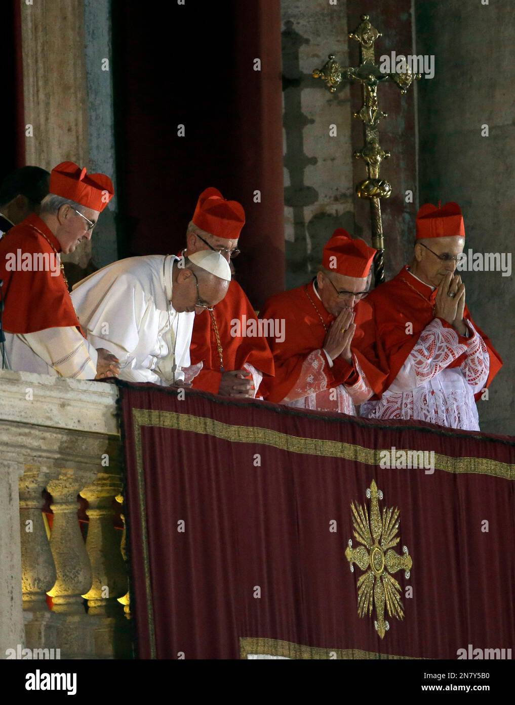 Pope Francis speaks from the central balcony of St. Peter's Basilica at ...
