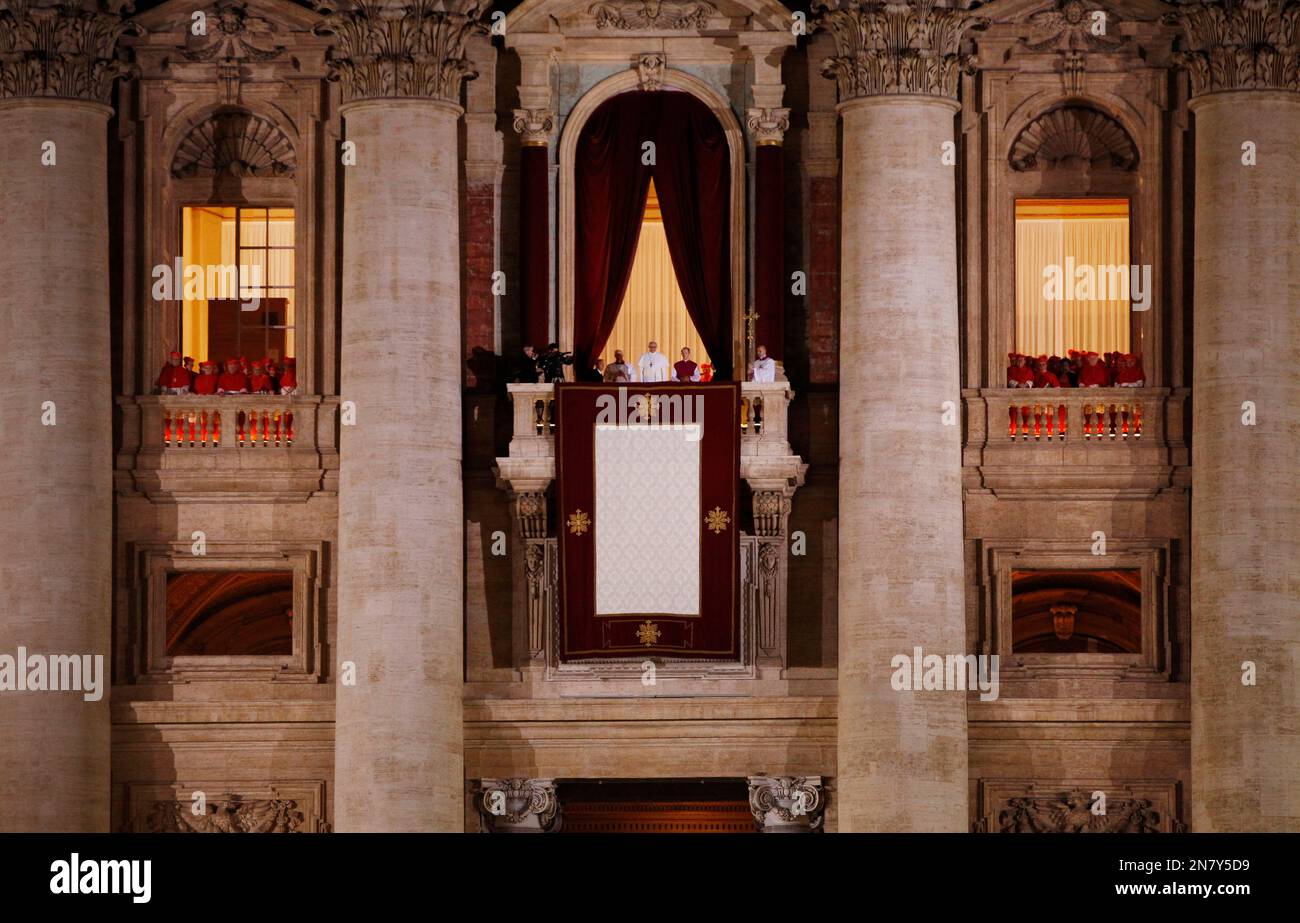 Pope Francis speak to the crowd from the central balcony of St. Peter's ...