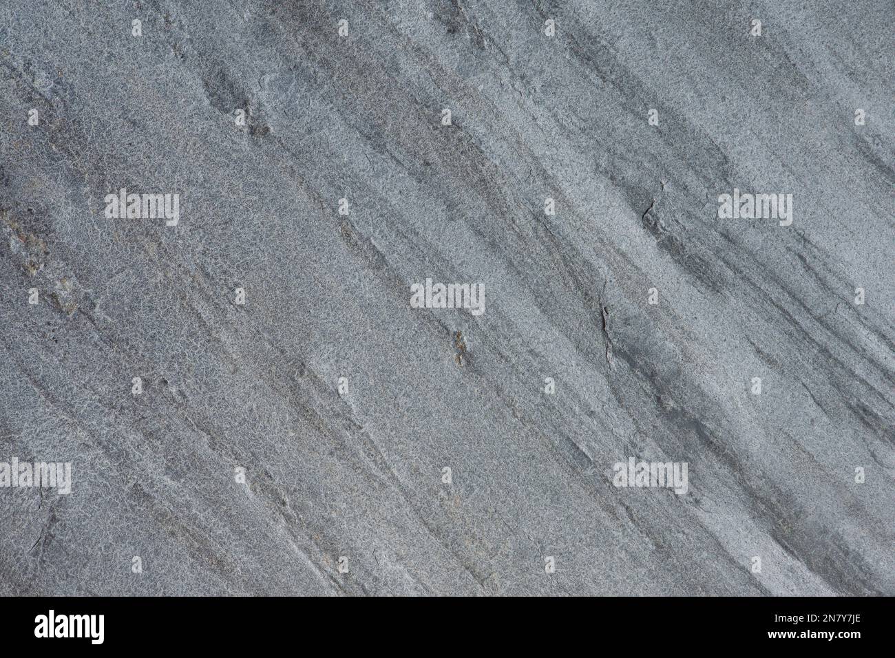 Samples of gray stone with a wavy pattern for the interior. Texture of ...