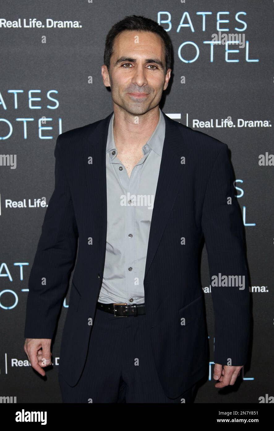 Cast member Nestor Carbonell arrives at the premiere of the A&E ...