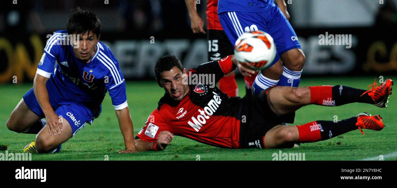 Chile's Universidad de Chile's Albert Acevedo, left, and Argentina's ...