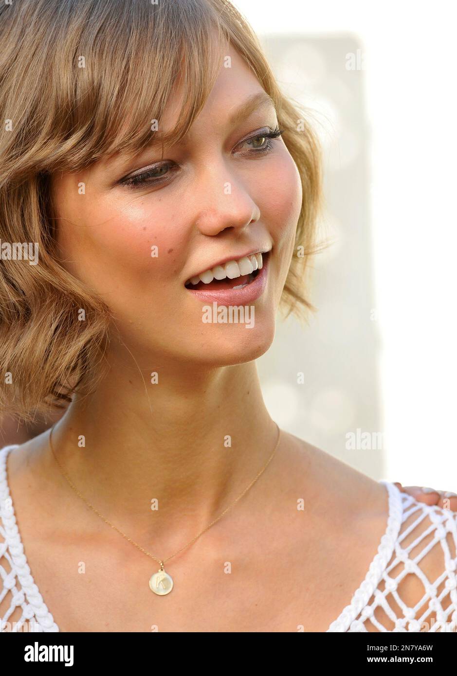 Model Karlie Kloss poses at the reveal of Victoria's Secret 2013 Swim ...