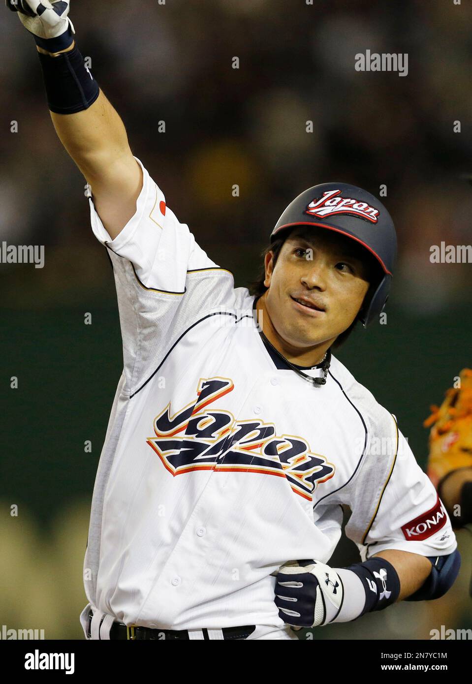 Japan's third baseman Nobuhiro Matsuda reacts after hitting an RBI ...