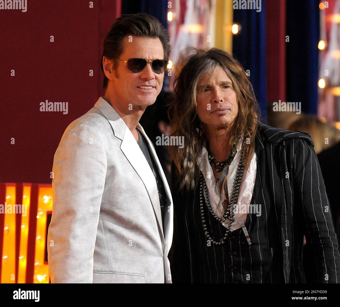 Actor Jim Carrey, left, and singer Steven Tyler arrive at the world ...