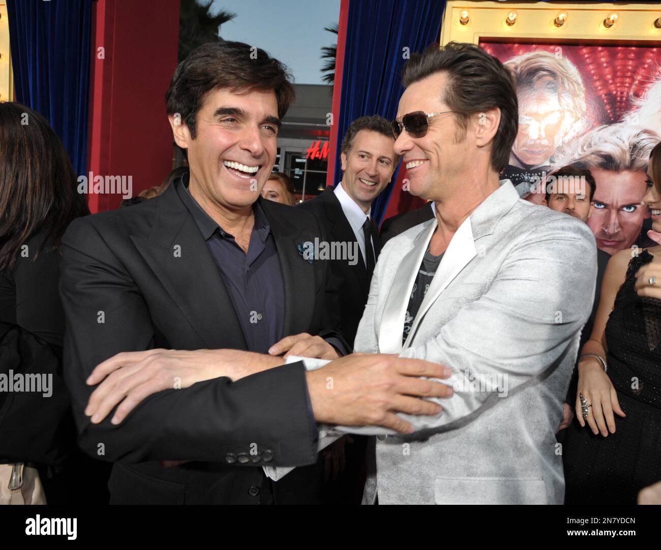 Illusionist David Copperfield, left, and actor Jim Carrey arrive at the ...