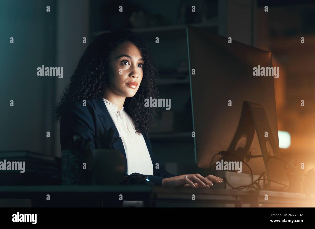 Night, office and black woman on computer for business project ...