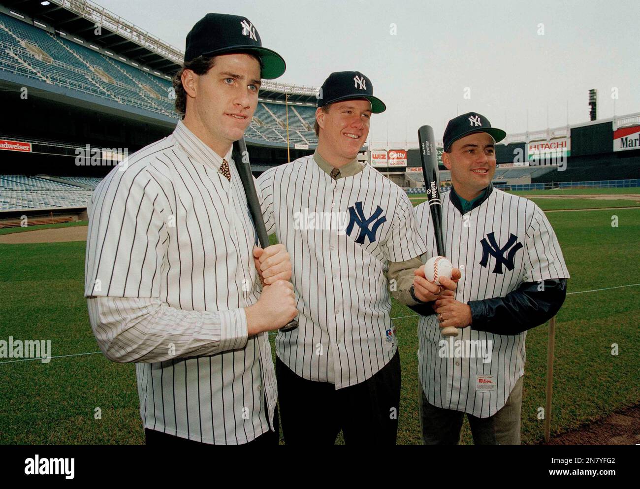 Three new Yankees pose in pinstripes for photographers at Yankee ...