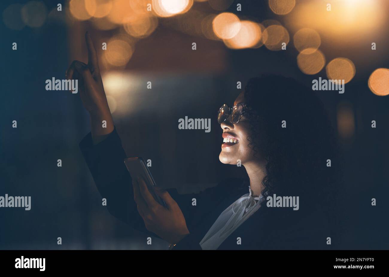 Young woman pointing at stars hi-res stock photography and images - Alamy