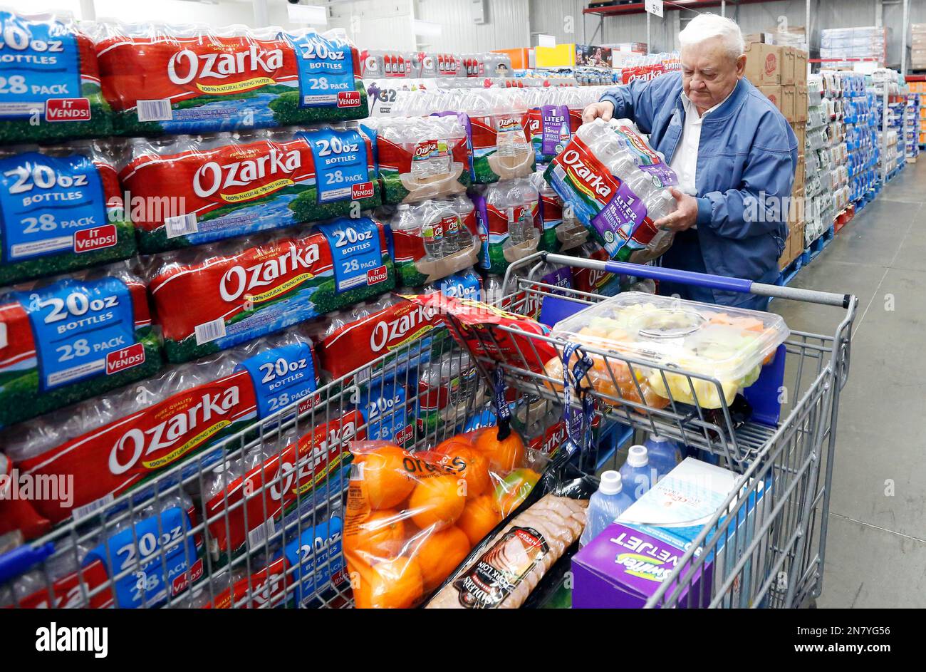 Walter Pugh, 83, of Belzoni, Miss., loads a case of his favorite ...