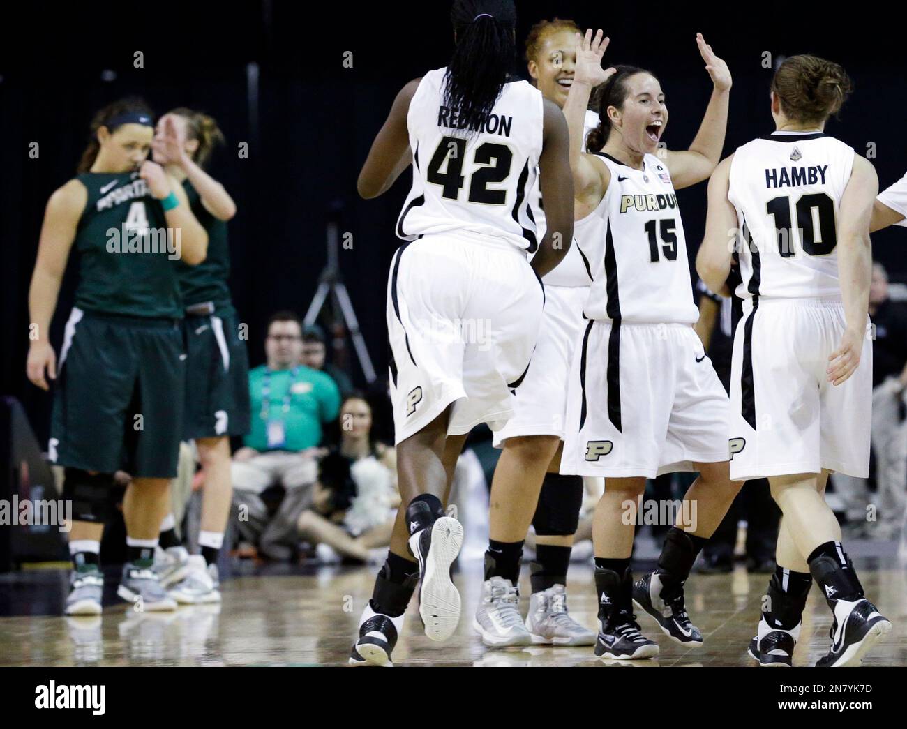 Purdue guard Courtney Moses (15) celebrates with teammates as Michigan ...