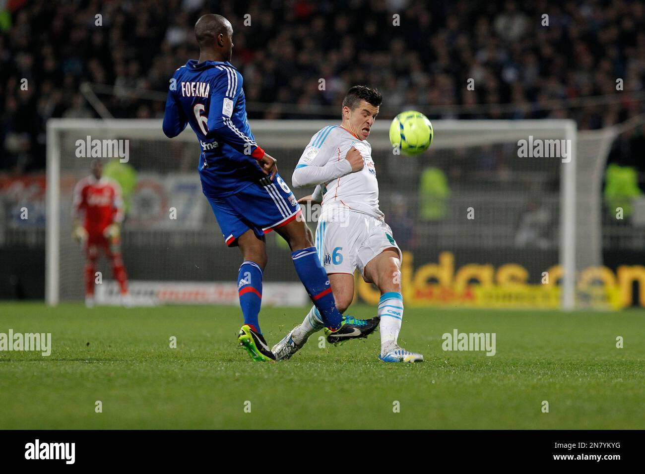 Lyon's Gueida Fofana, left, challenges Marseille's Joseph Anthony ...