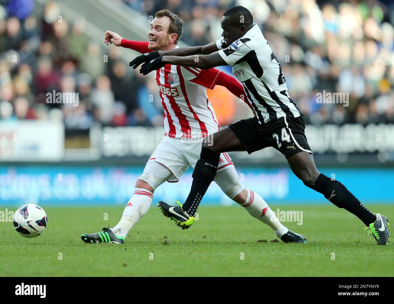 Newcastle United's Cheick Tiote, right, vies for the ball with Stoke ...