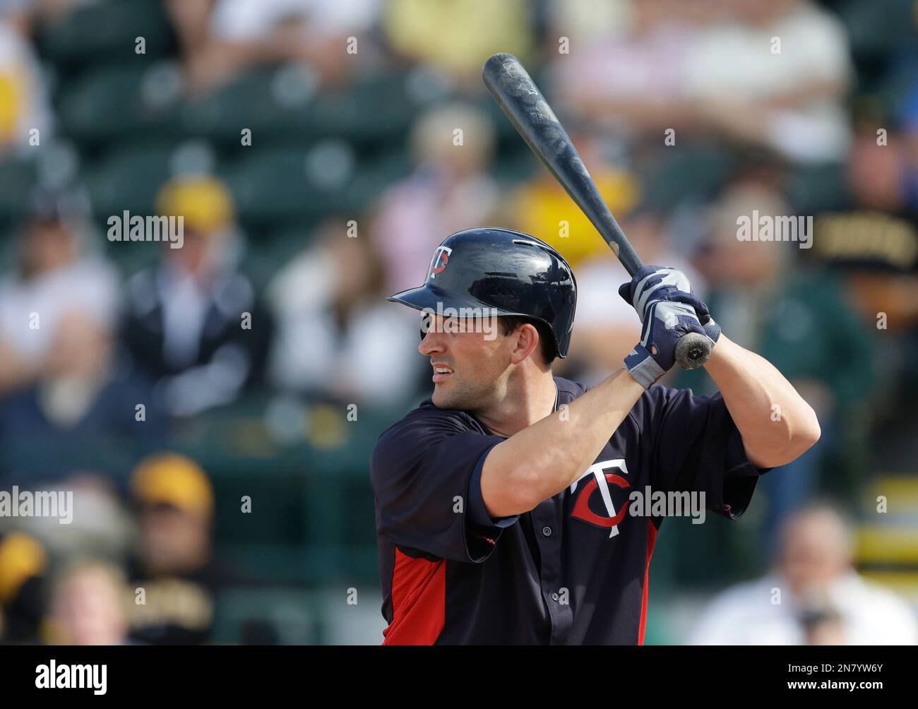 Minnesota Twins' Brian Dinkelman bats during an exhibition spring ...