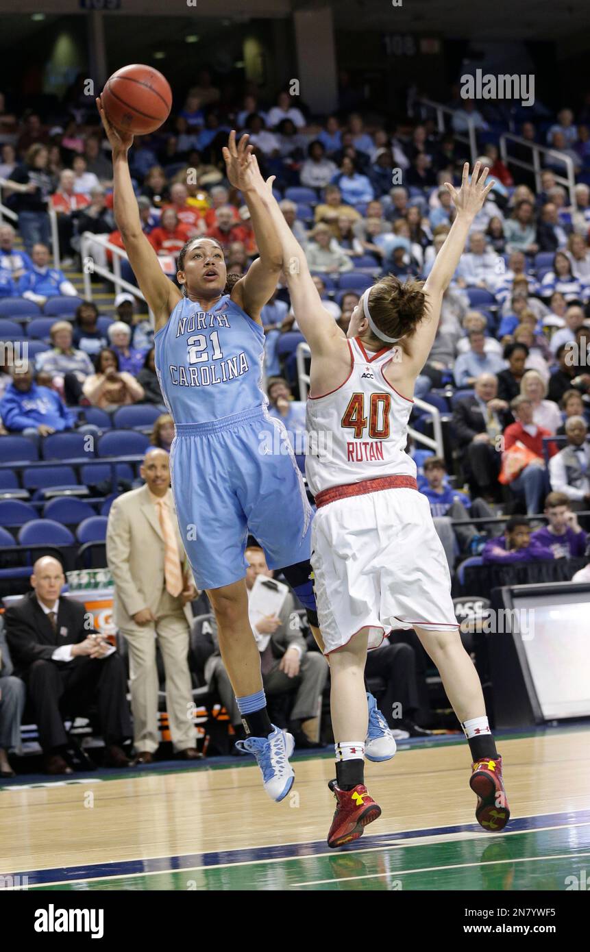 North Carolina's Krista Gross (21) shoots over Maryland's Katie Rutan ...