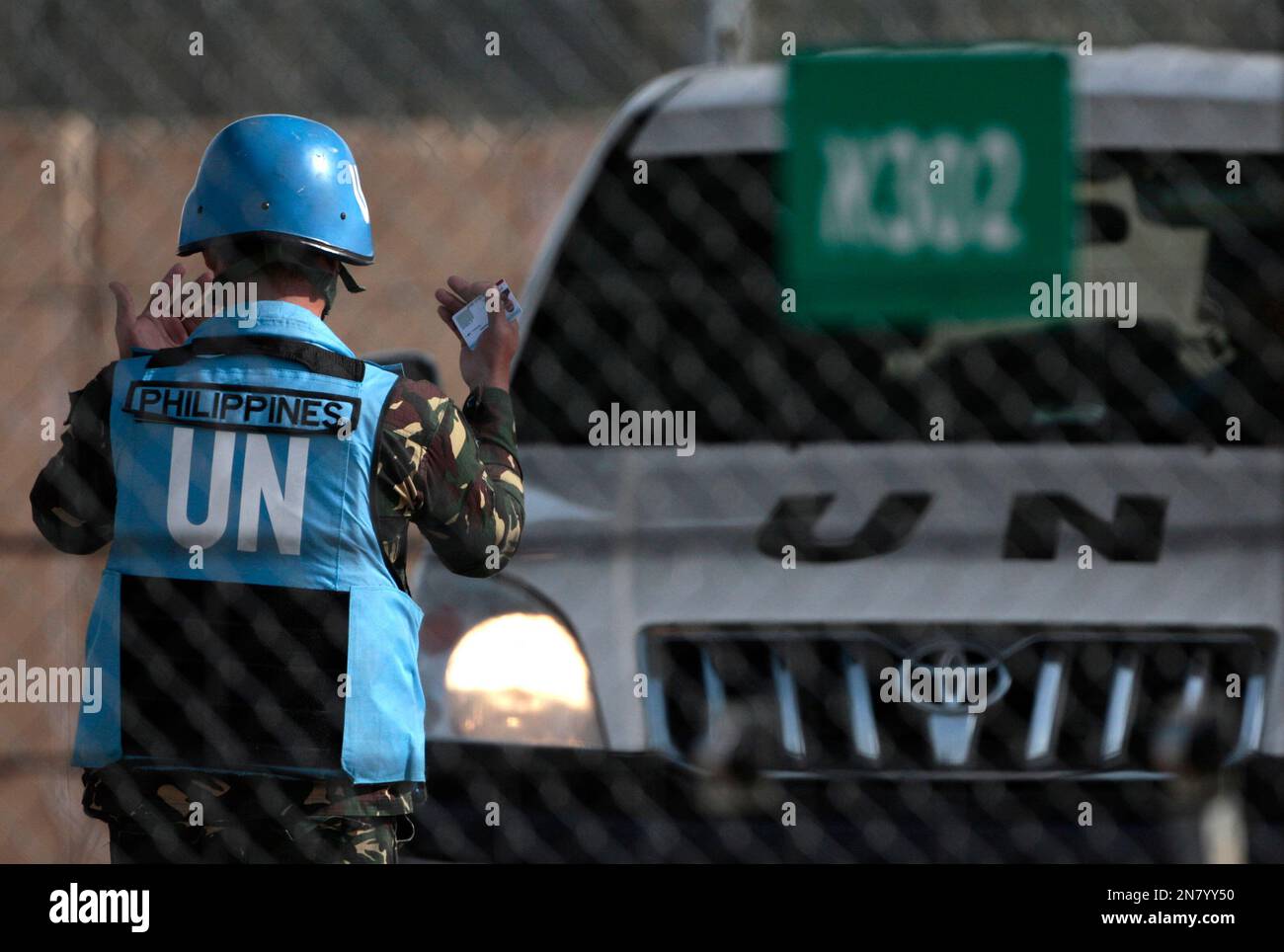 A U.N. peacekeeper from the Philippines UNDOF force works at the ...