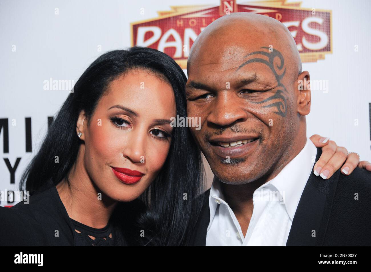 Kiki Tyson, left, and Mike Tyson arrive at the LA premiere of "Mike ...
