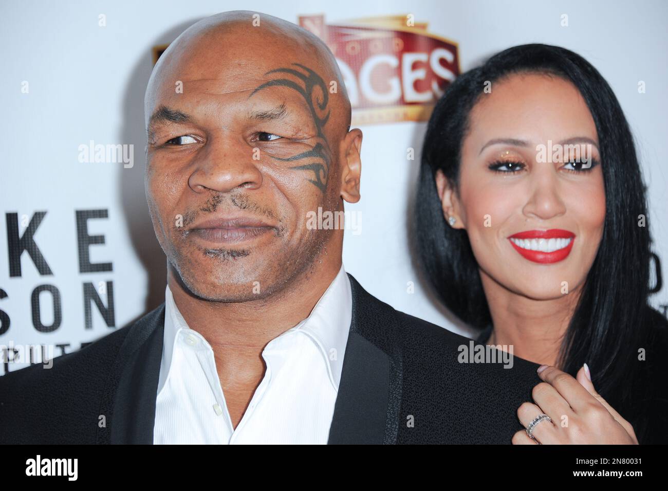 MikeTyson, left, and Kiki Tyson arrive at the LA premiere of "Mike ...